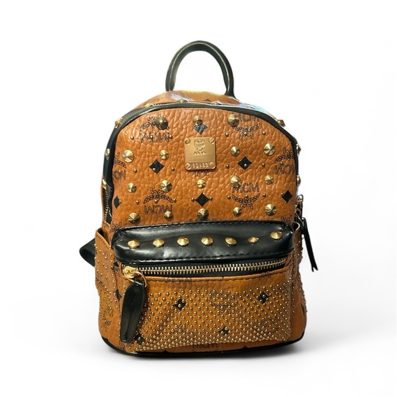 MCM | Bags | Mcm Tan And Black Backpack With Gold Accents | Poshmark